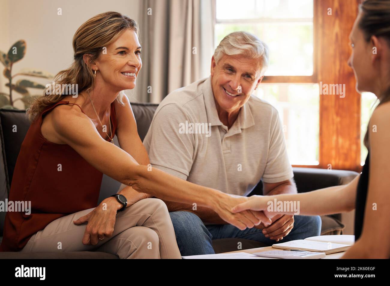 Senior couple, handshake and finance worker welcome, thank you or ...