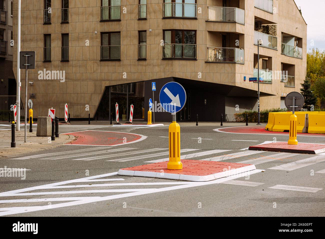 Pedestrian crossing with road markings and signs Stock Photo - Alamy