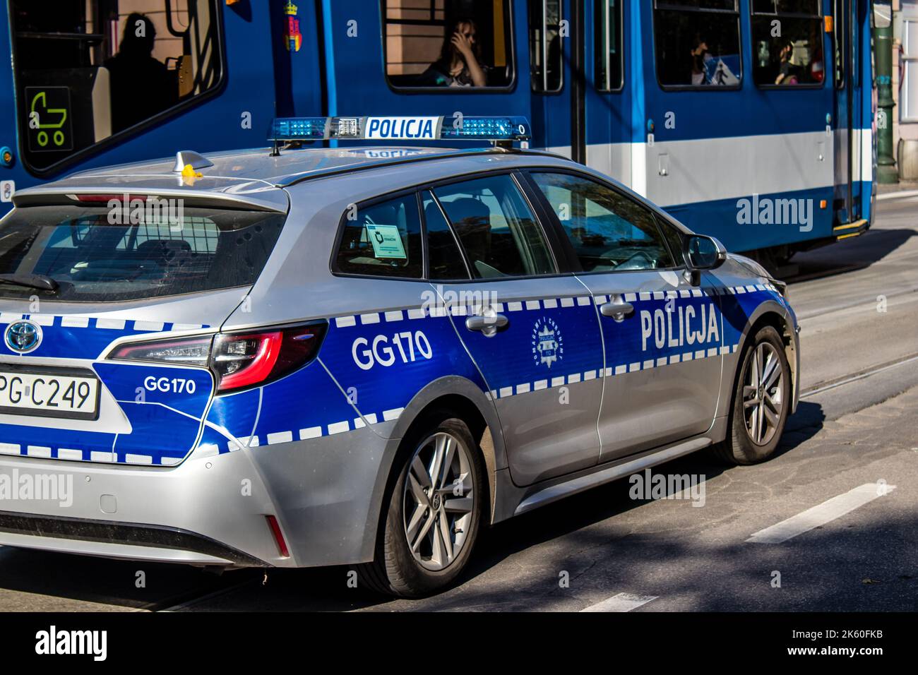 Krakow, Poland - October 08, 2022 Police car driving in the city center ...