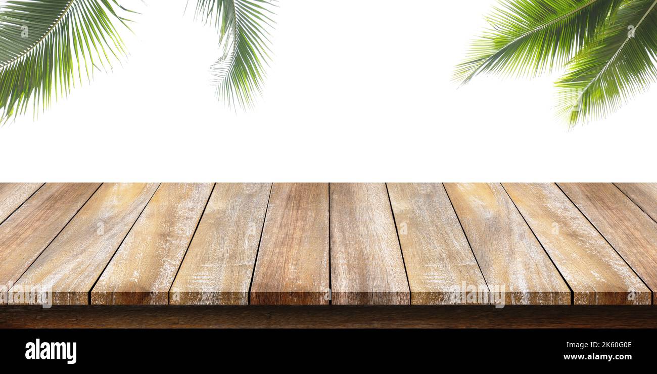 Empty of wooden table top with a coconut green leaf on white background ...