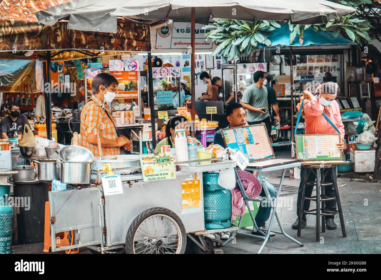 Street food stall in China Town in Bangkok by Yaowarat Road Stock Photo ...