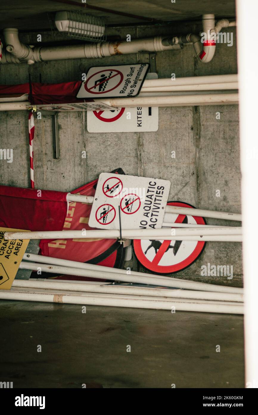 A vertical shot of Lifeguard signs abandoned in a storage Stock Photo ...