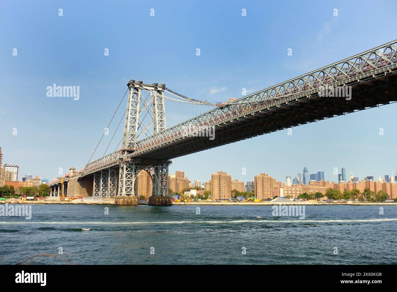 The Williamsburg Bridge on the East River in New York City Stock Photo ...
