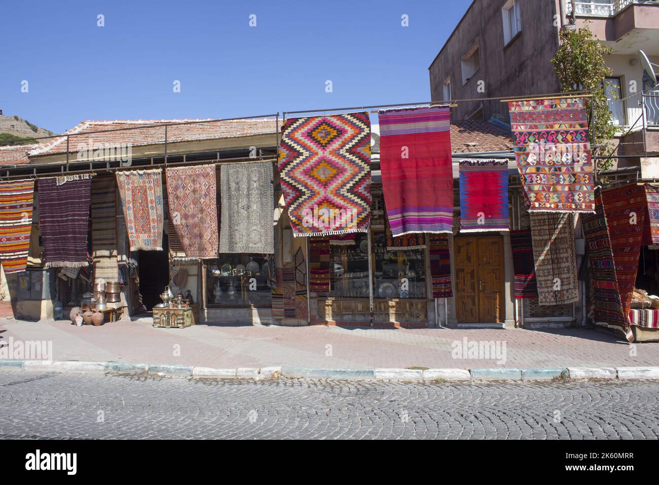 Handmade carpets, hand weaving rugs is hanging in front of the ...