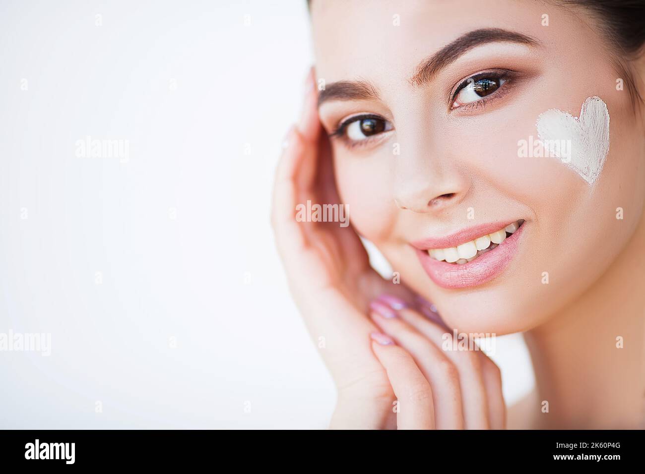Female face with perfect skin using cream Stock Photo - Alamy