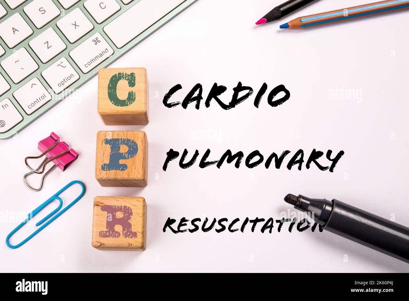 CPR - Cardiopulmonary Resuscitation. Stationery and computer keyboard ...
