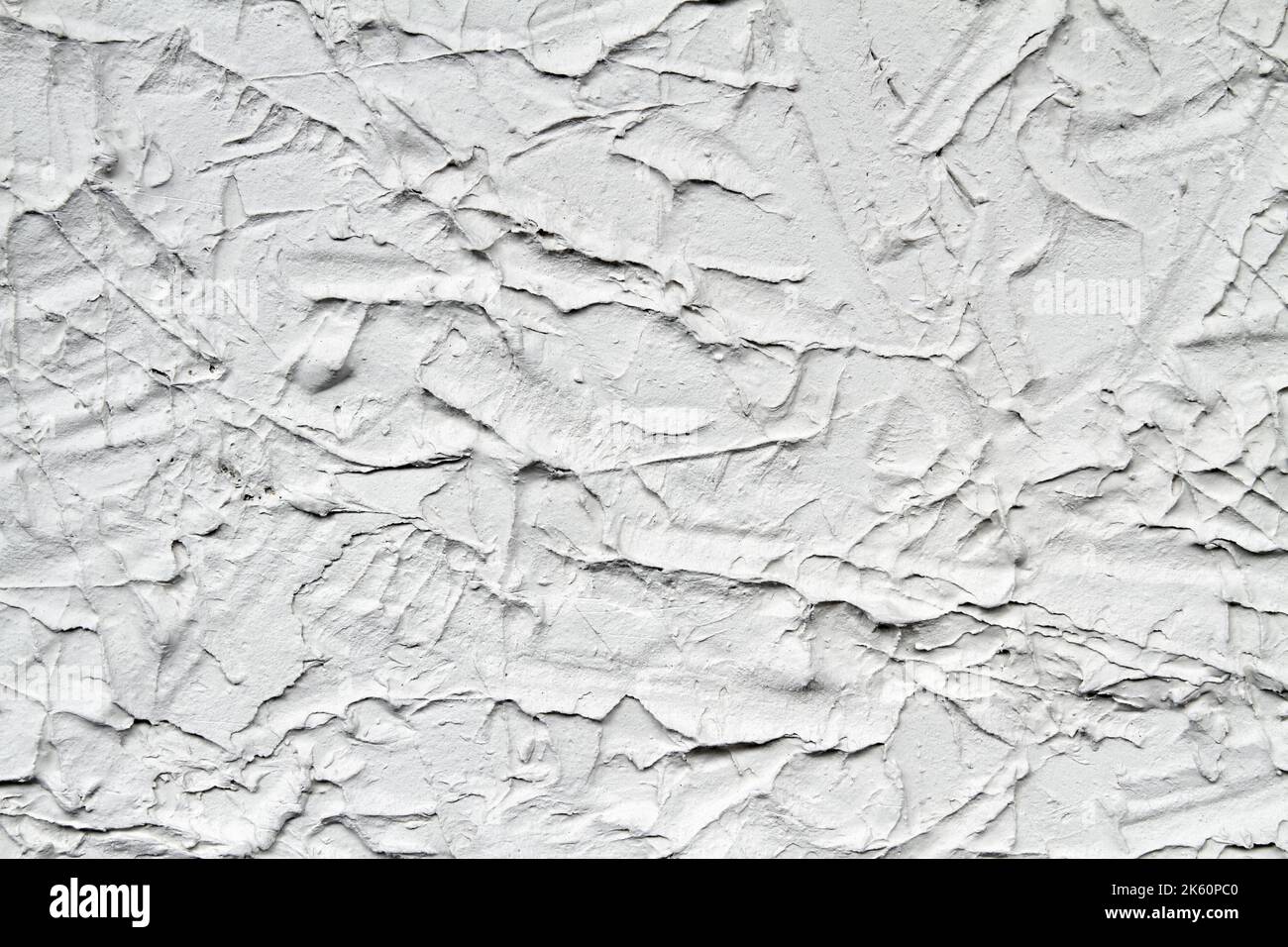 Decorative gray plaster effect on wall. Plaster texture. Closeup Stock ...