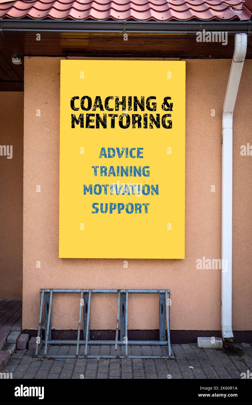 Coaching and Mentoring. Yellow advertising banner with text Stock Photo ...