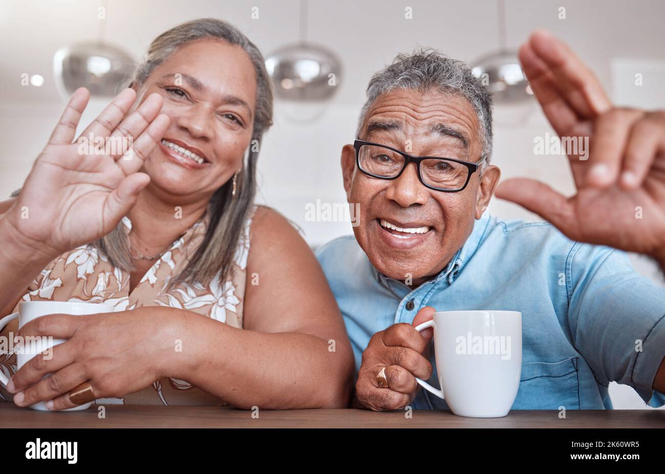 Senior couple, coffee and wave for video call smiling, talking or ...