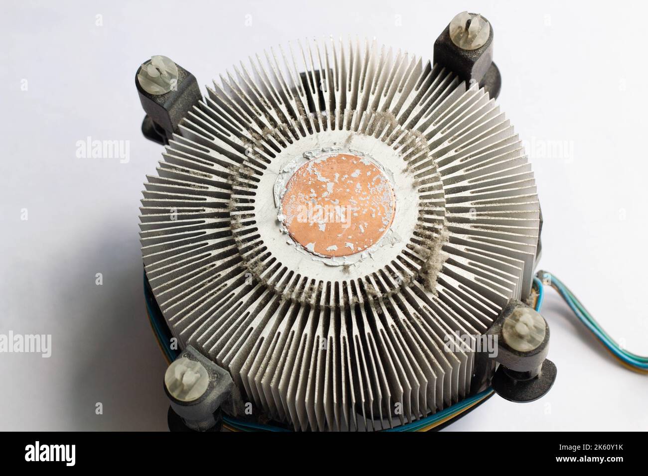 Very dirty cooling radiator for a computer processor. Dusty aluminum cooler for a CPU microchip ...