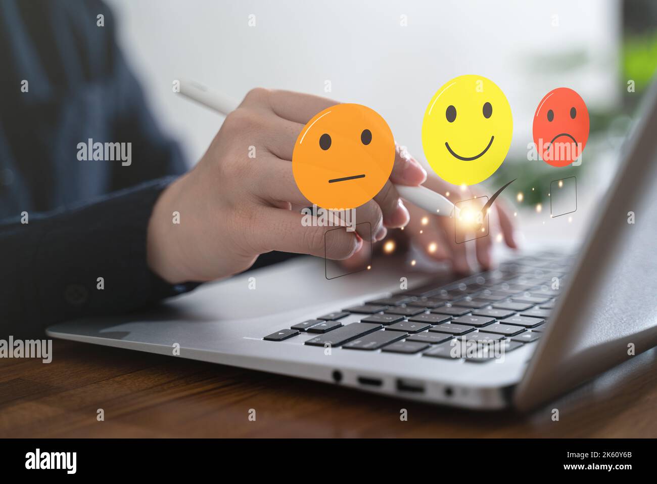 Customer using laptop to rate their satisfaction ranking for experience ...