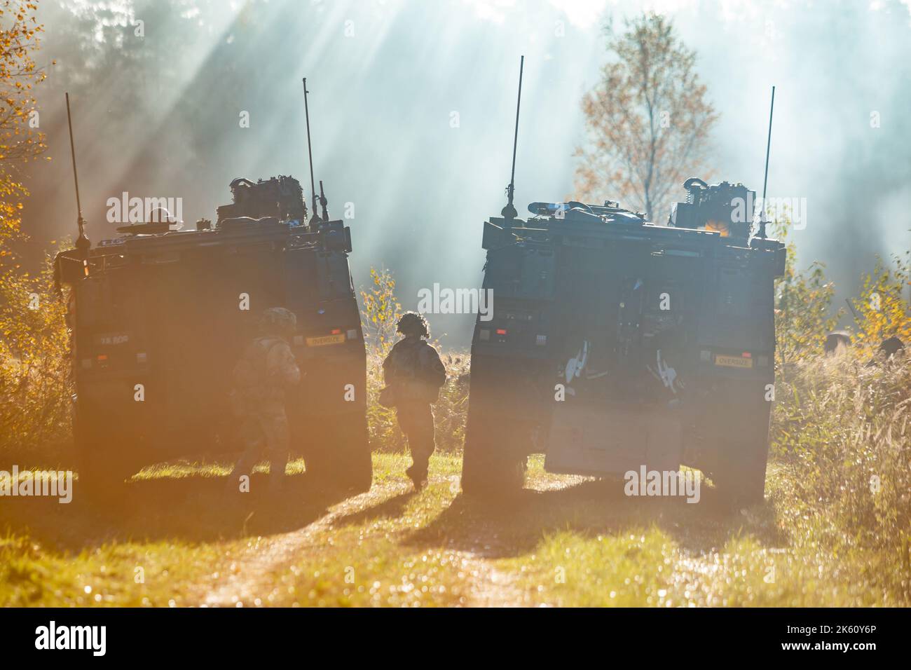 Military training on the battlefield with armored vehicles Stock Photo ...