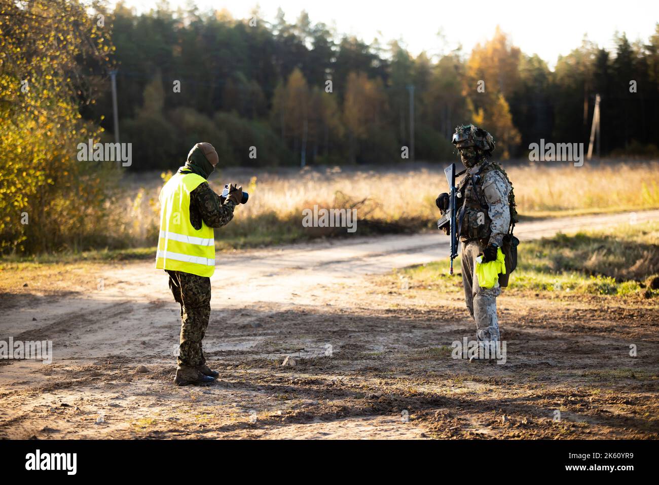 Photographer takes a picture of a soldier Stock Photo - Alamy