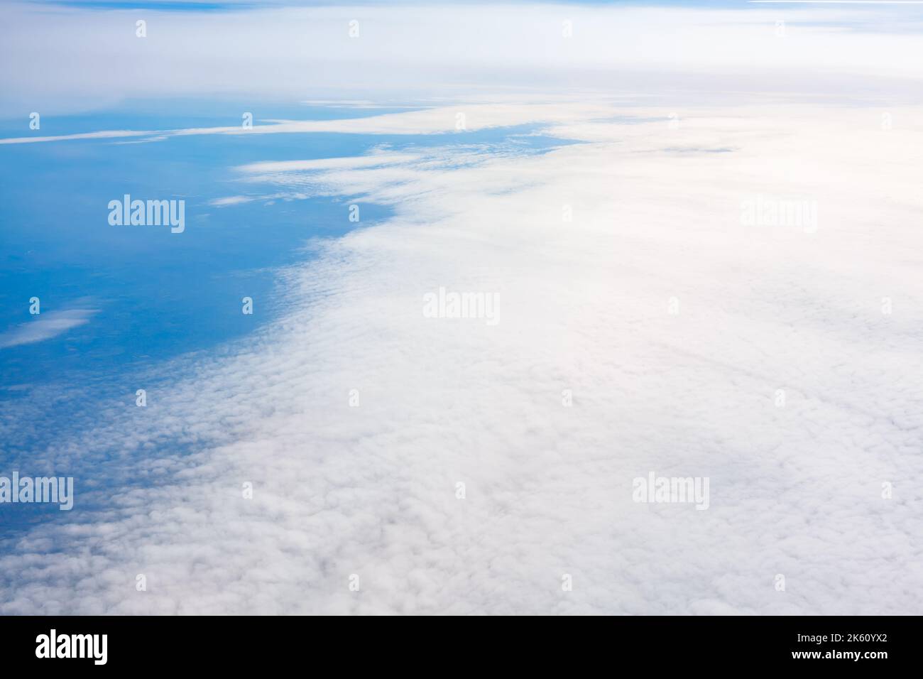 Flight over white clouds . Outer space view from the aircraft Stock ...