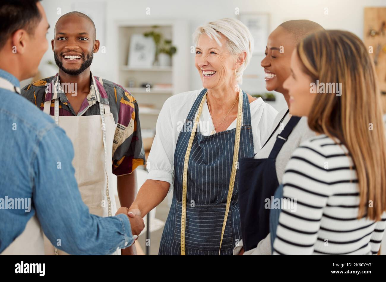Group of happy diverse creative designers having a meeting while ...