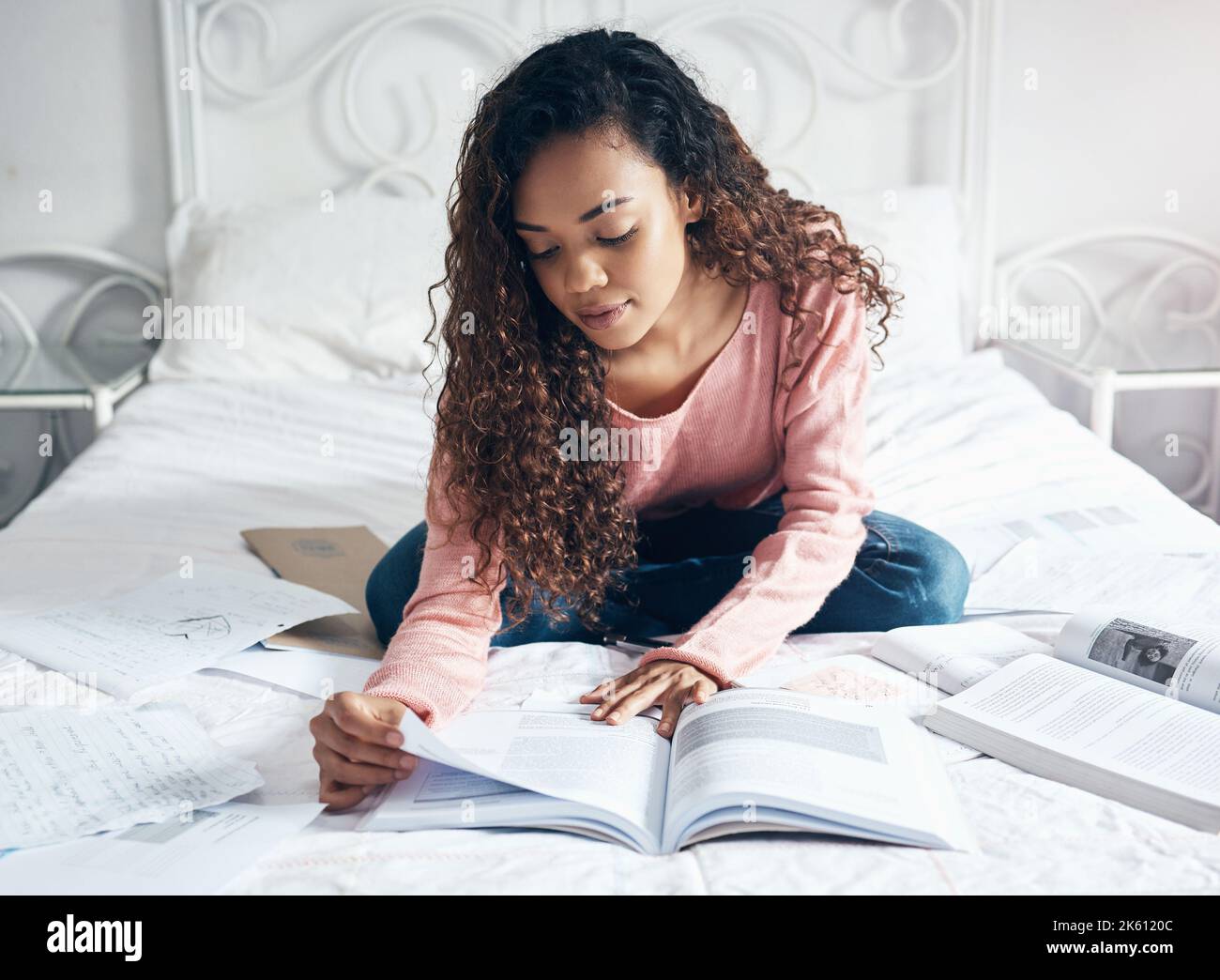 Study, learning and student bedroom bed work of a black woman studying ...