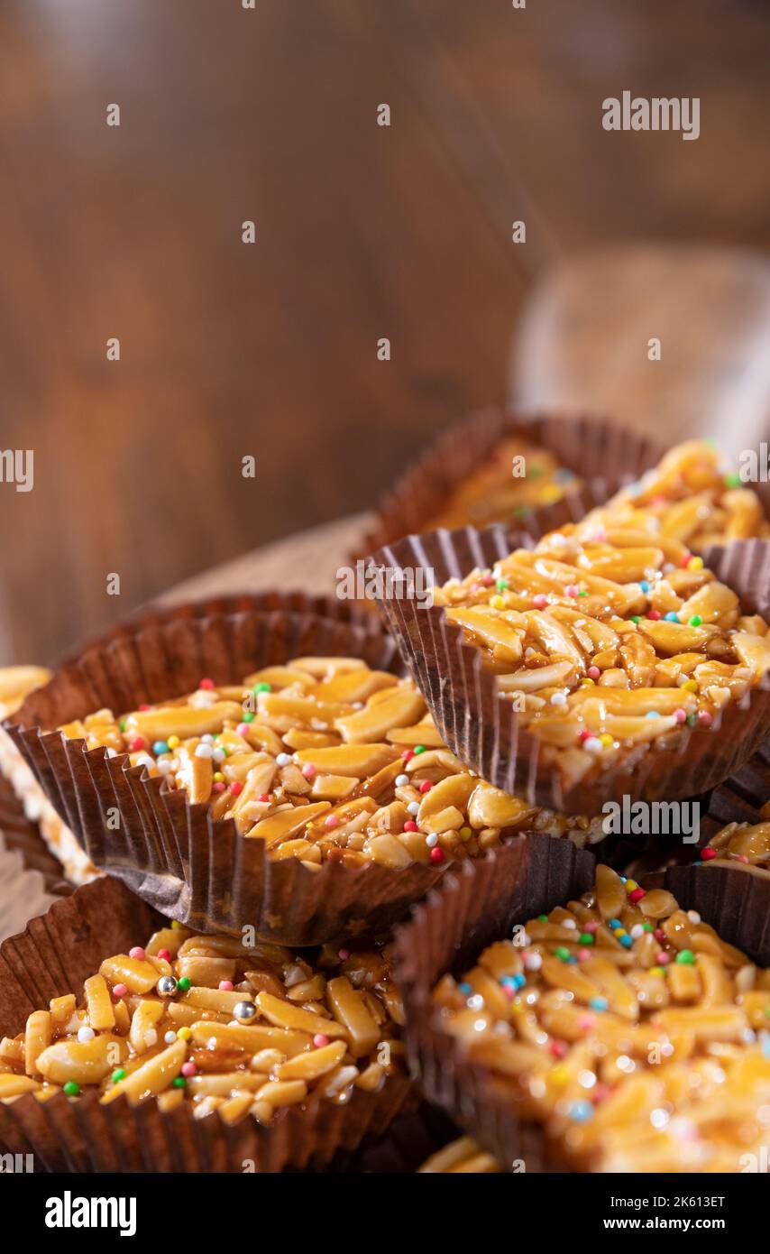 Desserts with almonds, peanuts and seeds in caramel. Traditional ...