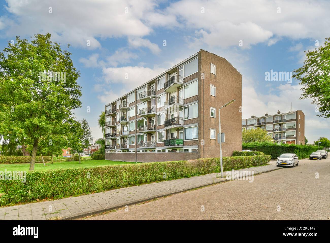 View of street near building with beauty of vegetation outside Stock ...