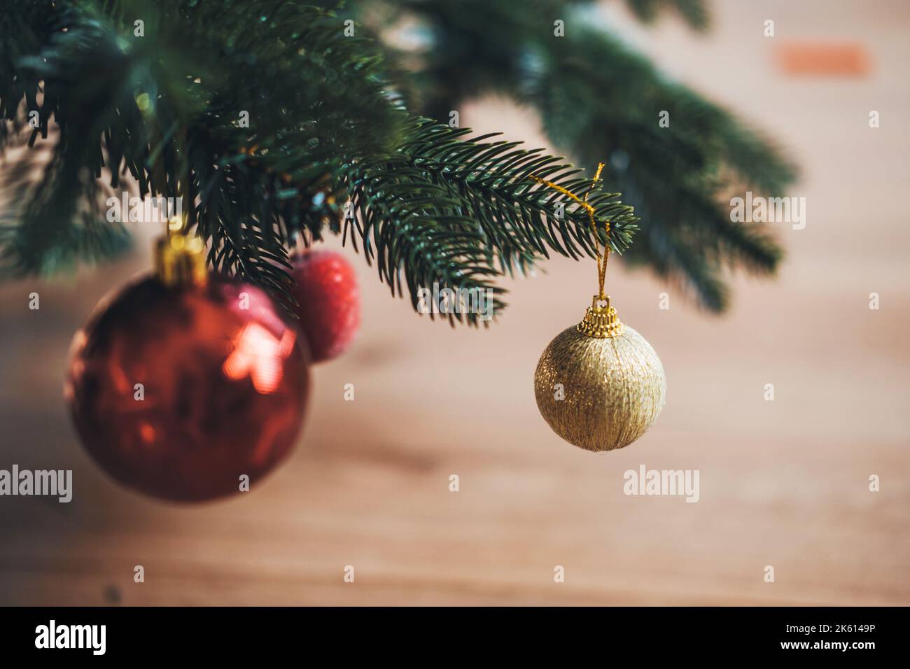 Close-up portrait of Christmas tree ornament hanging on a pine tree to ...