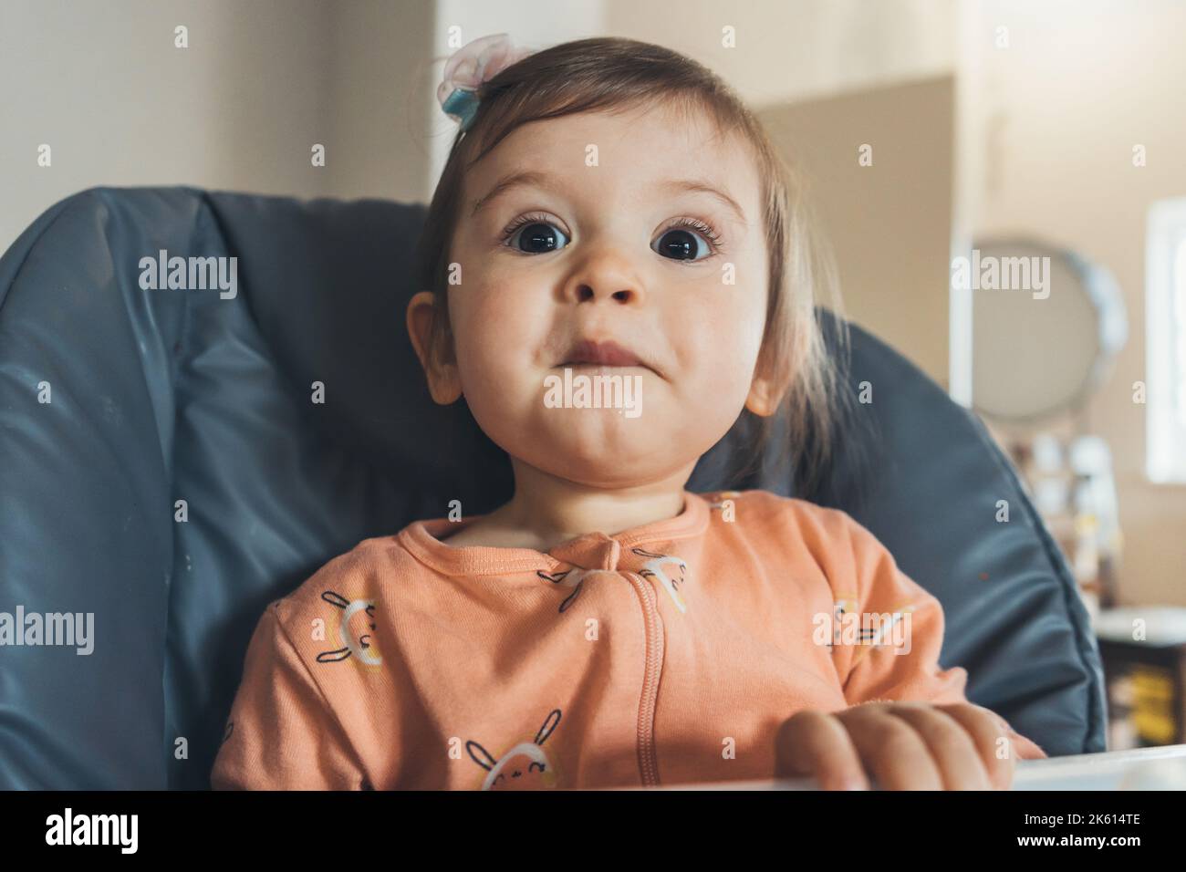 Infant girl making face hi-res stock photography and images - Alamy