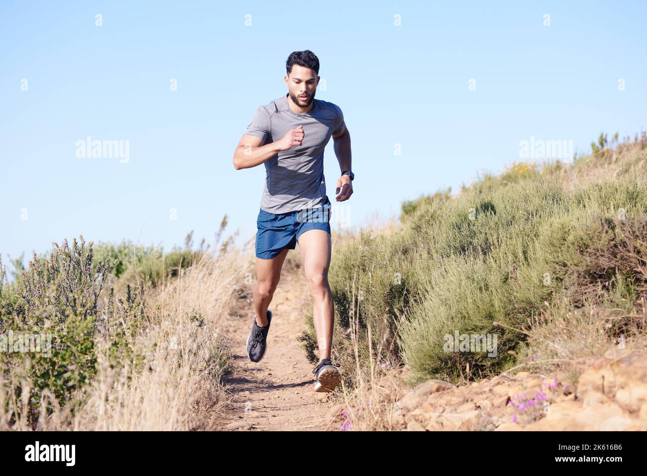 Fitness, mountain and man running in nature for exercise, cardio health ...