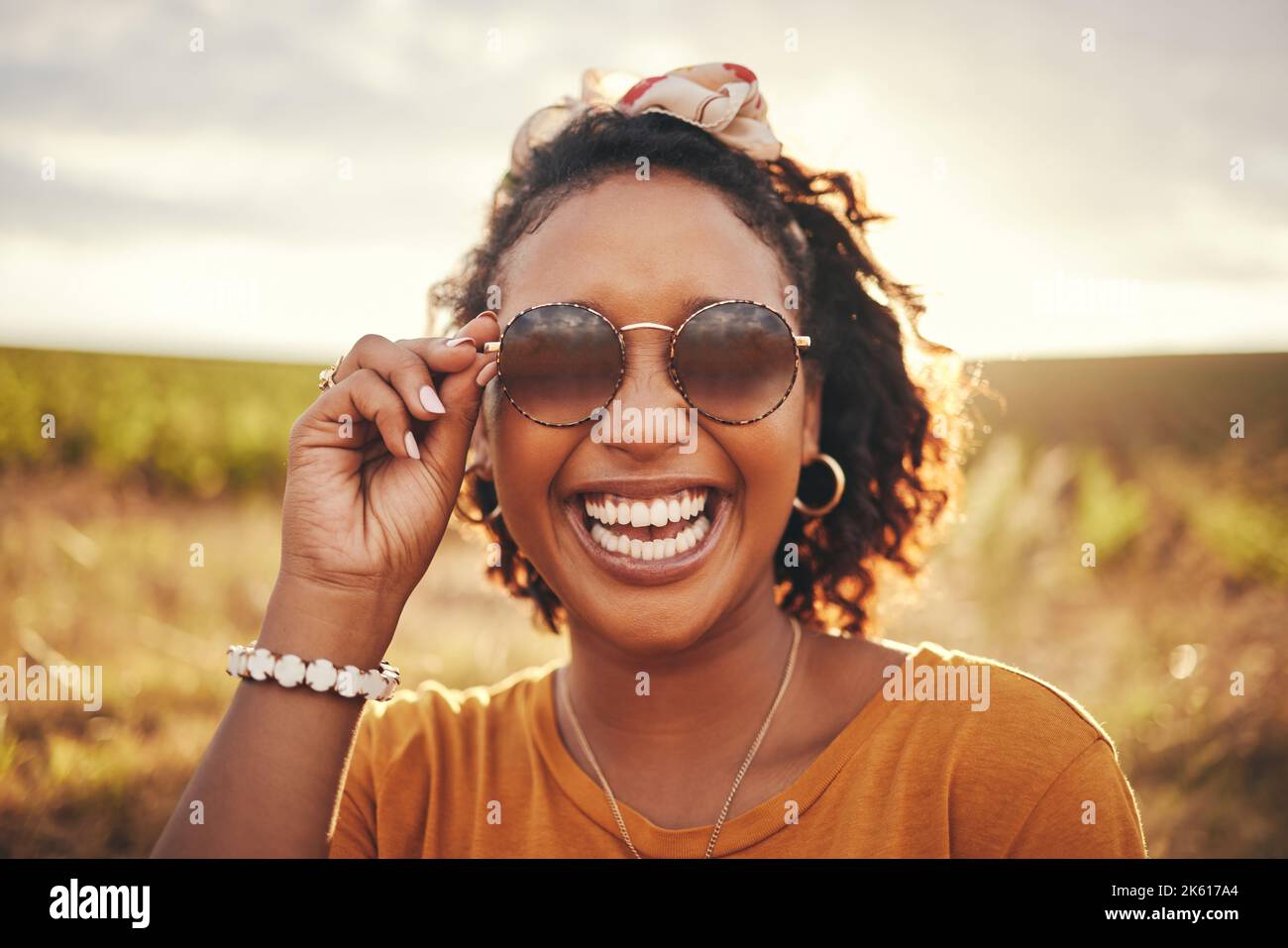 Happy, freedom and black woman with smile on a safari during a holiday ...