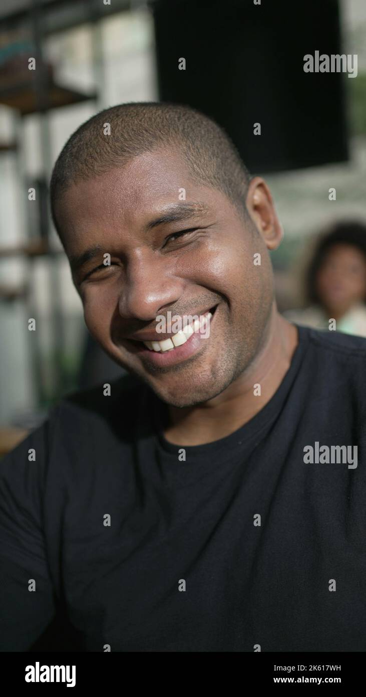 African American man portrait face smiling at camera. A charismatic ...