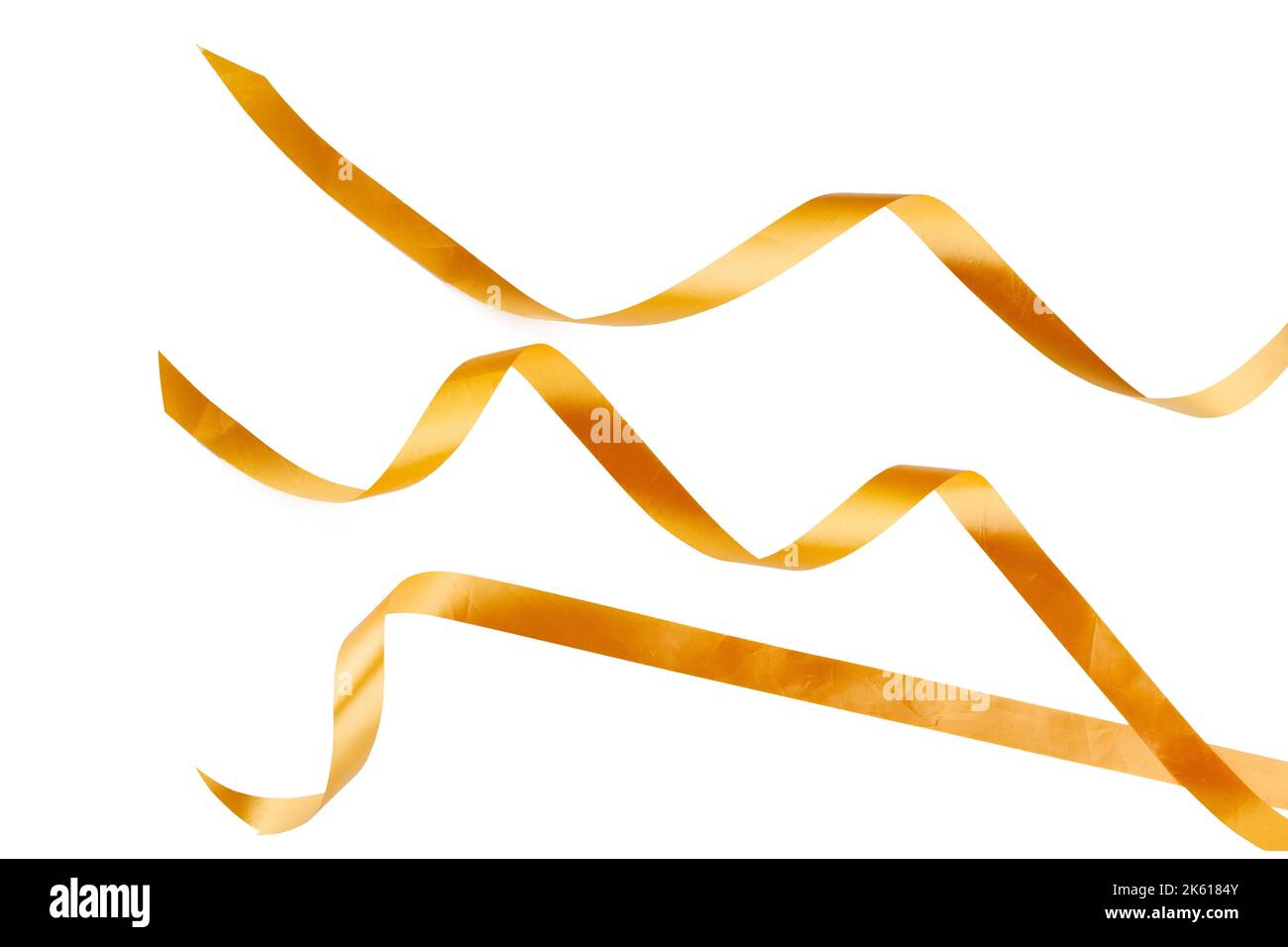 Satin golden ribbon isolated on white background Stock Photo - Alamy