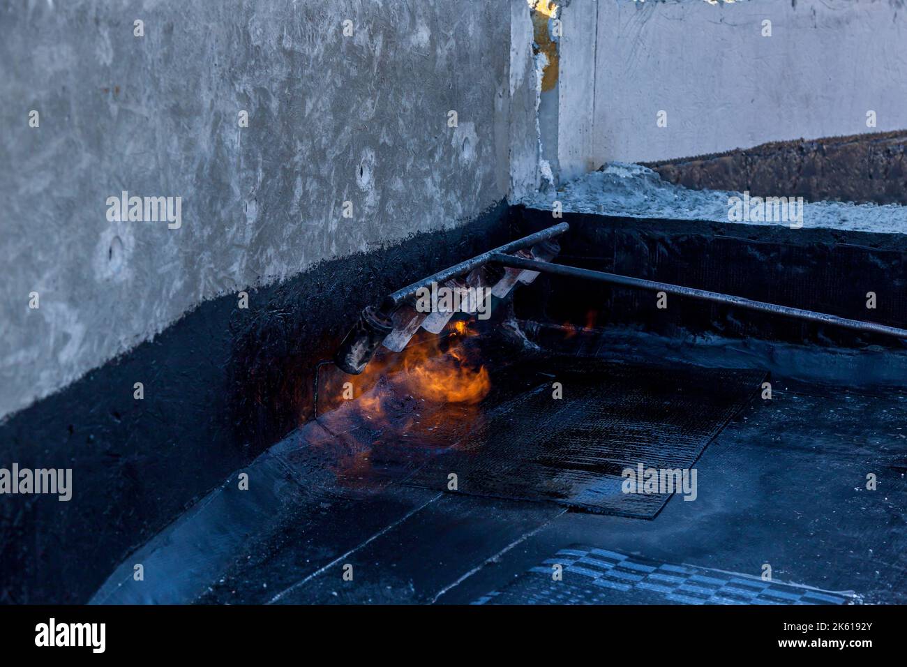 Laying and installation of roofing, bituminous waterproofing of an ...