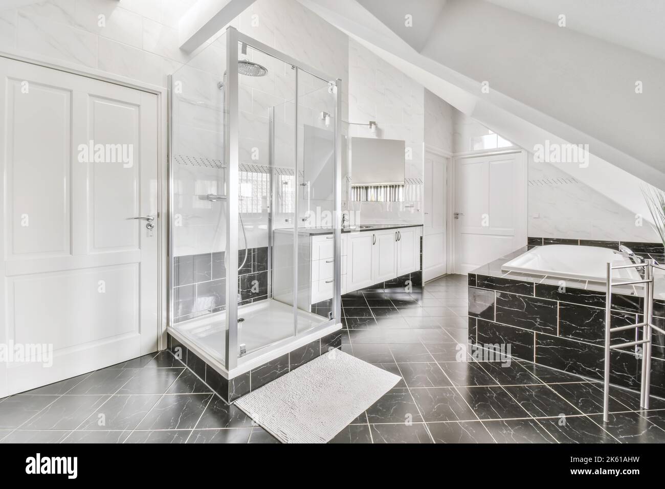 Interior of stylish light bathroom with ceramic bathtub sinks and glass ...