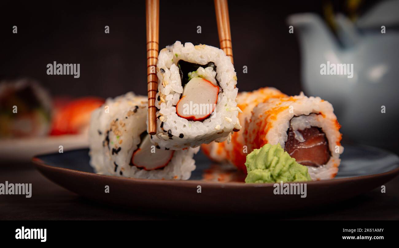 Eat sushi with chopsticks. Sushi turns Japanese food on its head in the ...