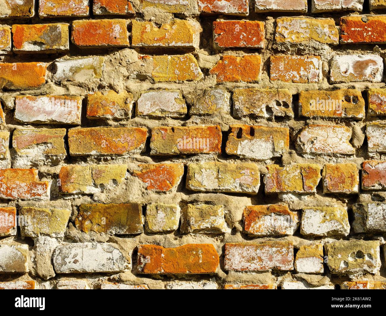 Texture of old weather-damaged brick wall as background Stock Photo - Alamy