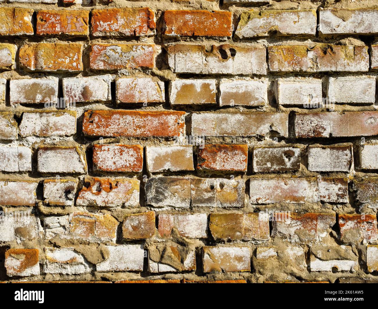 Texture of old brick wall destroyed by weather and time Stock Photo - Alamy
