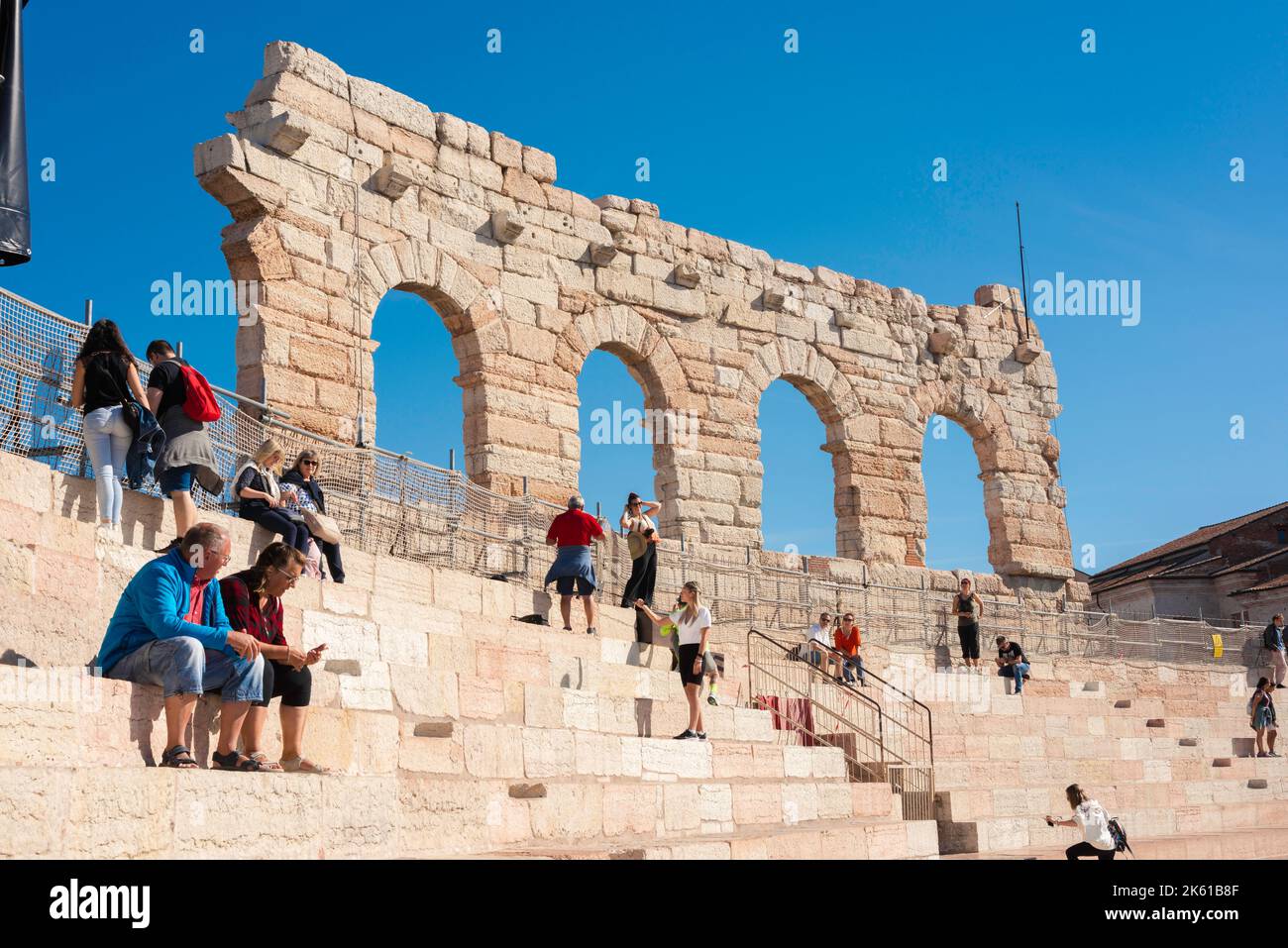 Verona Arena, view in summer of people exploring the interior of the ...
