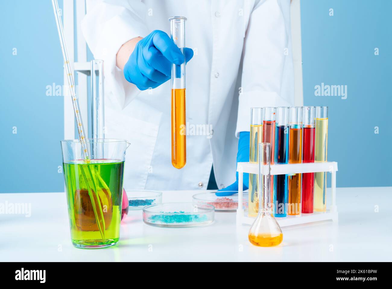 Scientific experiments in a chemistry lab. Color liquids and test tube ...