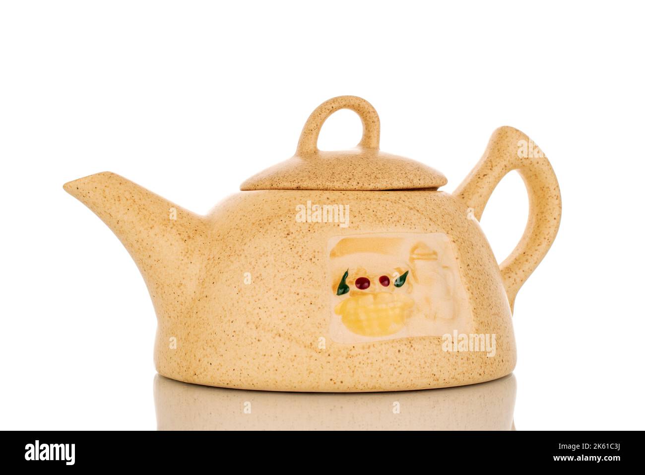 One clay teapot for brewing tea, macro, isolated on white background ...