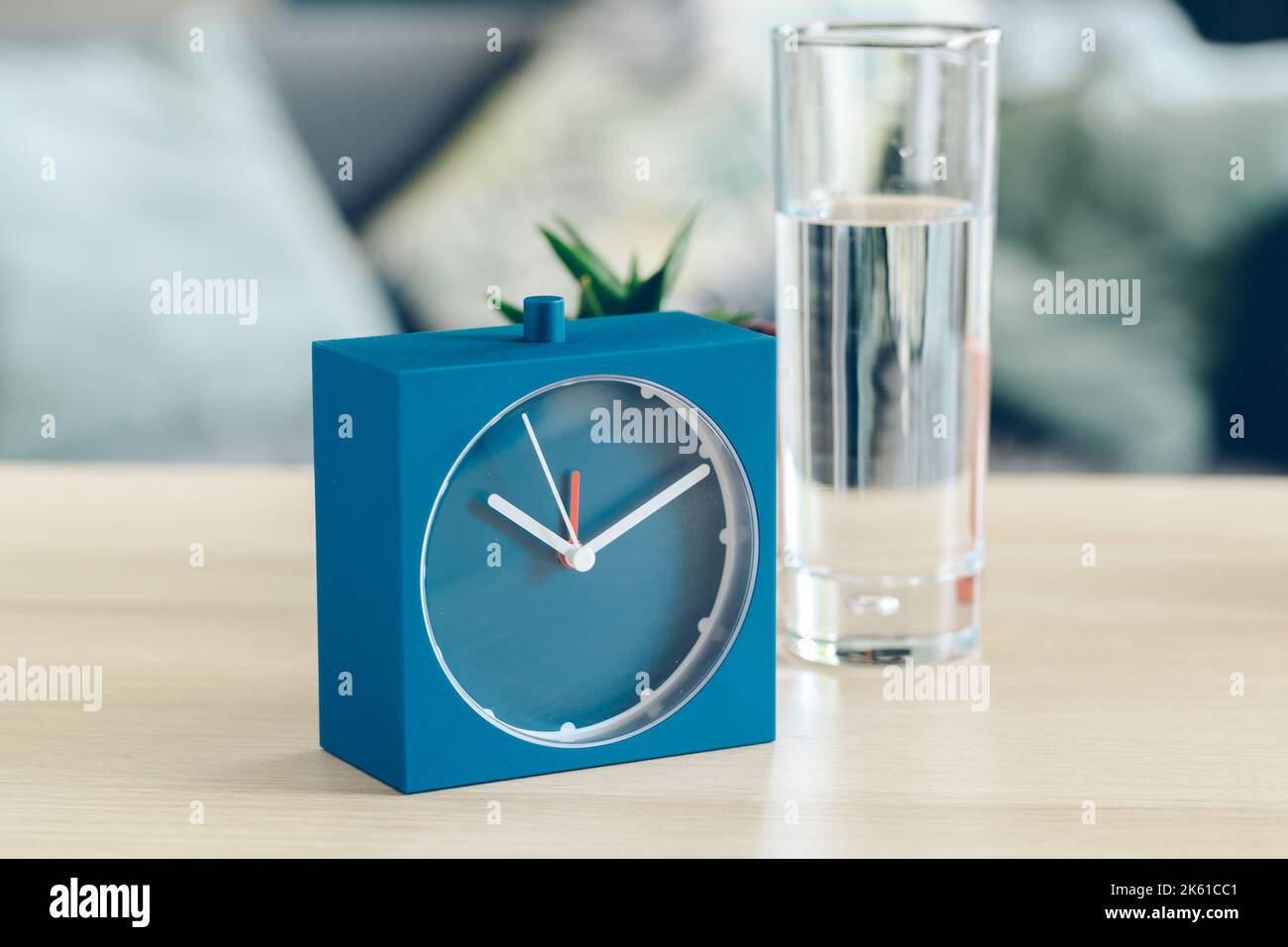Morning sun. Alarm clock on a beautiful background Stock Photo - Alamy