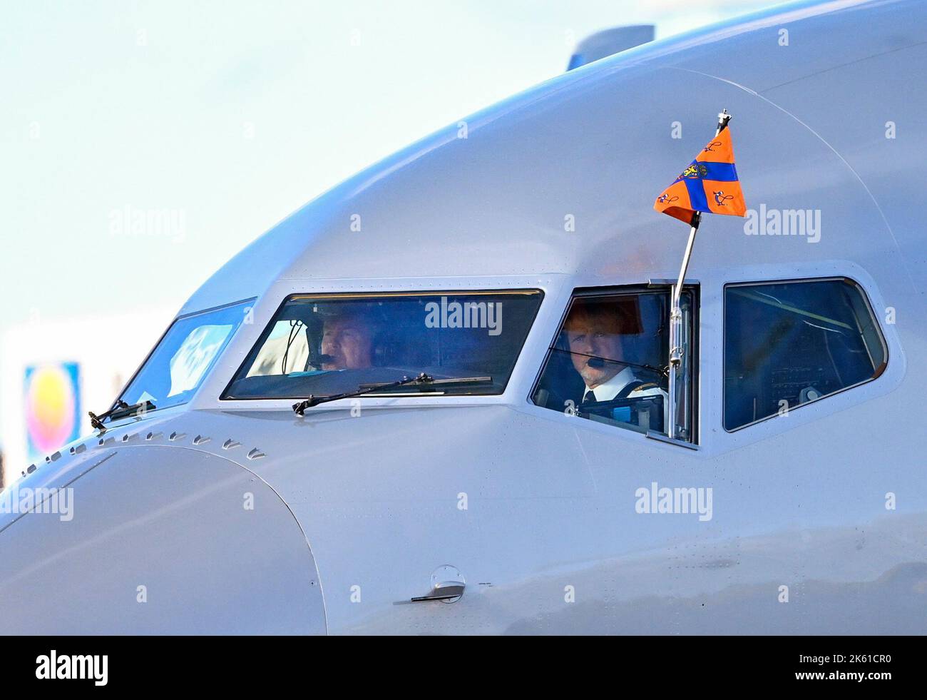 The Dutch King Willem-Alexander (left) sits in the cockpit of the plane ...