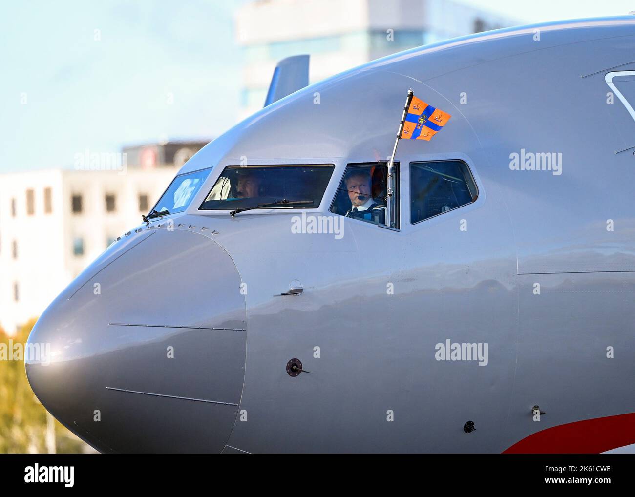 The Dutch King Willem-Alexander (left) sits in the cockpit of the plane ...