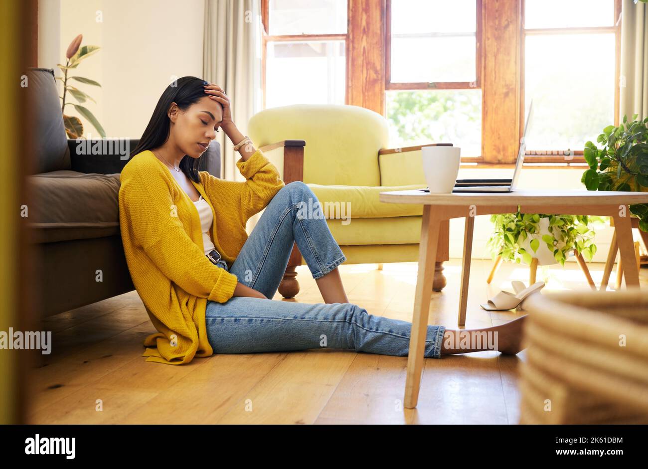 Stress, depression or burnout woman with laptop on living room floor ...
