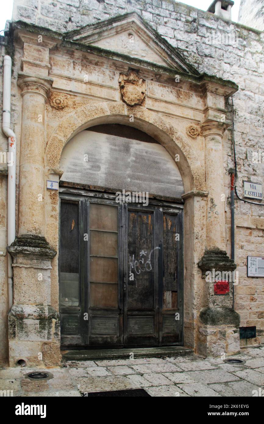 Beautiful imposing arched entrance with sculpted keystone and pediment ...