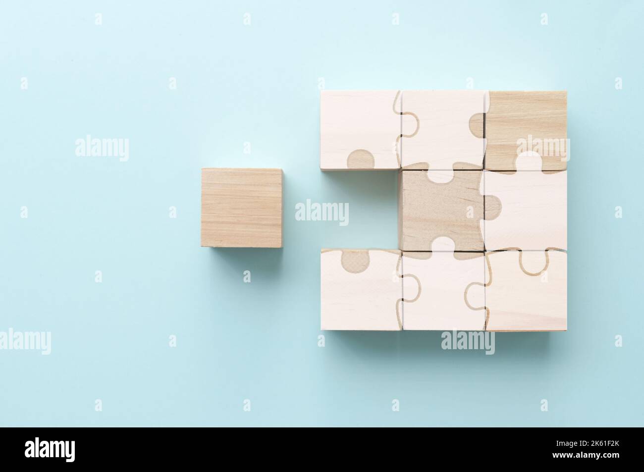 Wooden block missing piece from jigsaw puzzle Stock Photo - Alamy