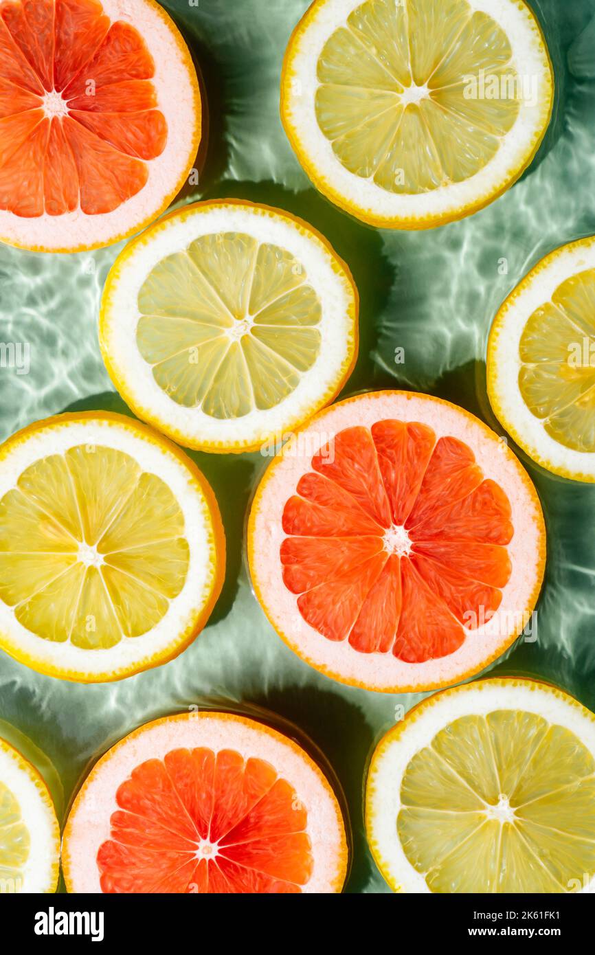 Vertical colorful background image of fruit citrus lemon, orange ...