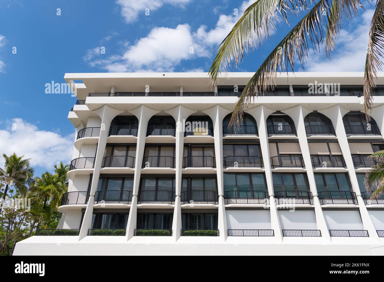 storey hotel building or residence with balconies on exterior Stock ...