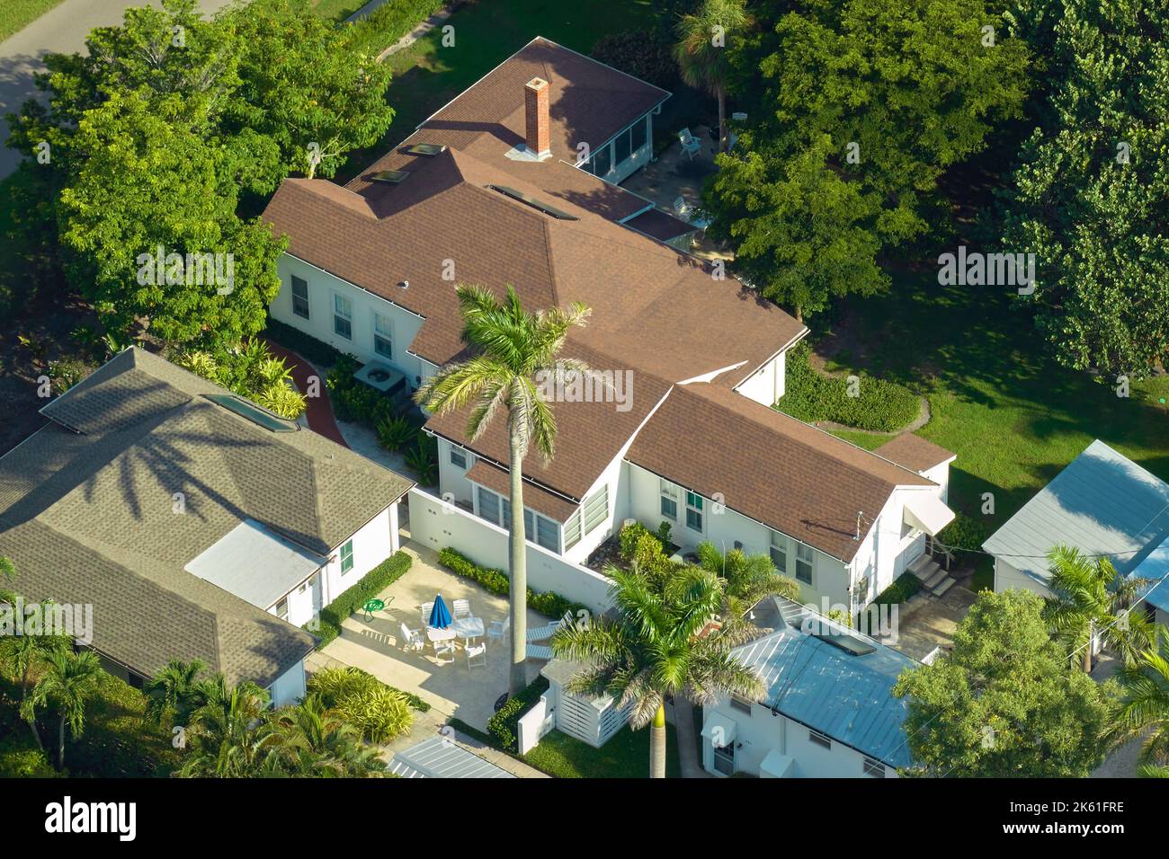 View from above of large residential houses in closed living golf club ...