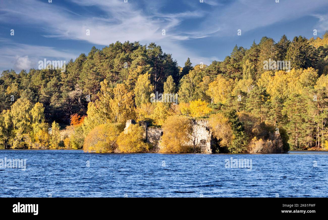 Loch an Eilein Aviemore Scotland a blue sky and trees with autumnal ...