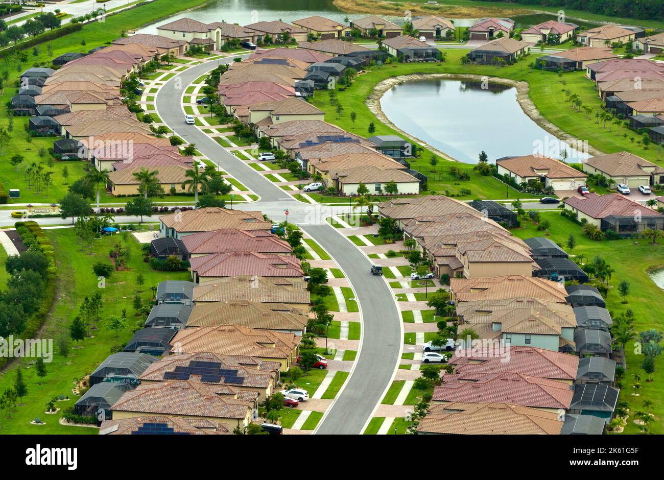 Aerial view of expensive modern houses with outside swimming pools ...