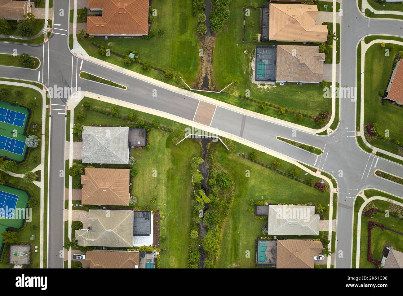 View from above of densely built residential houses in closed living ...