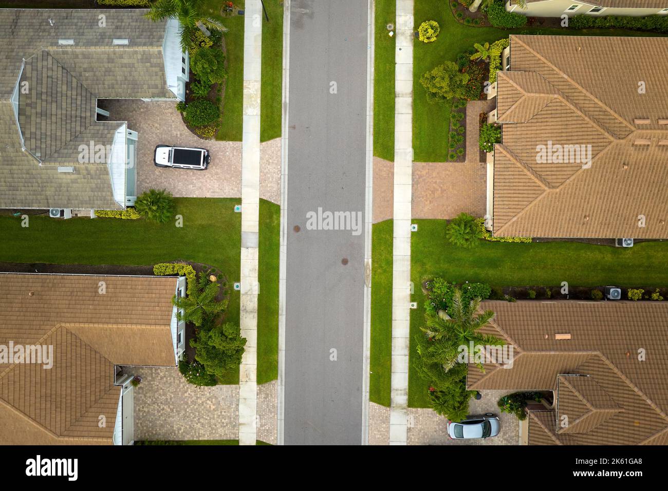 Aerial view of tightly located family houses in Florida closed suburban ...