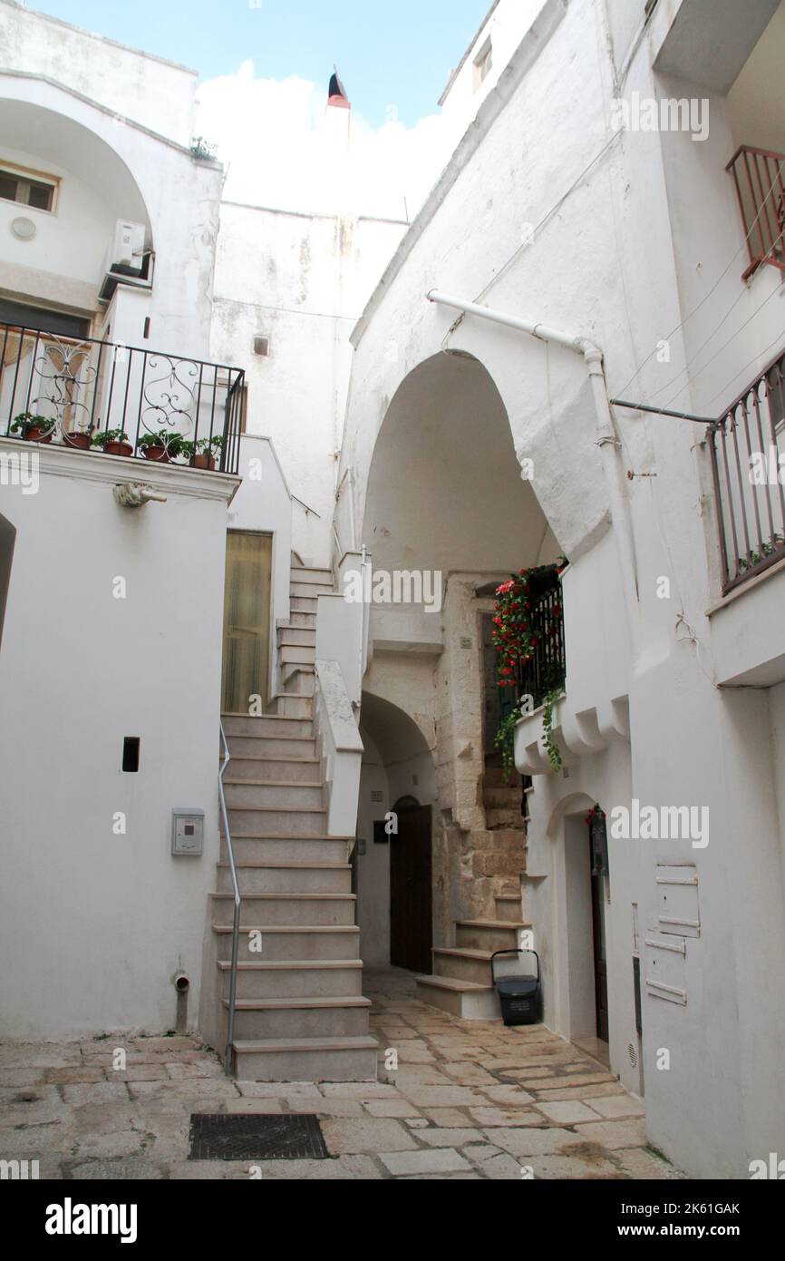 Cisternini, Puglia, Italy. Whitewashed stone buildings with outer ...